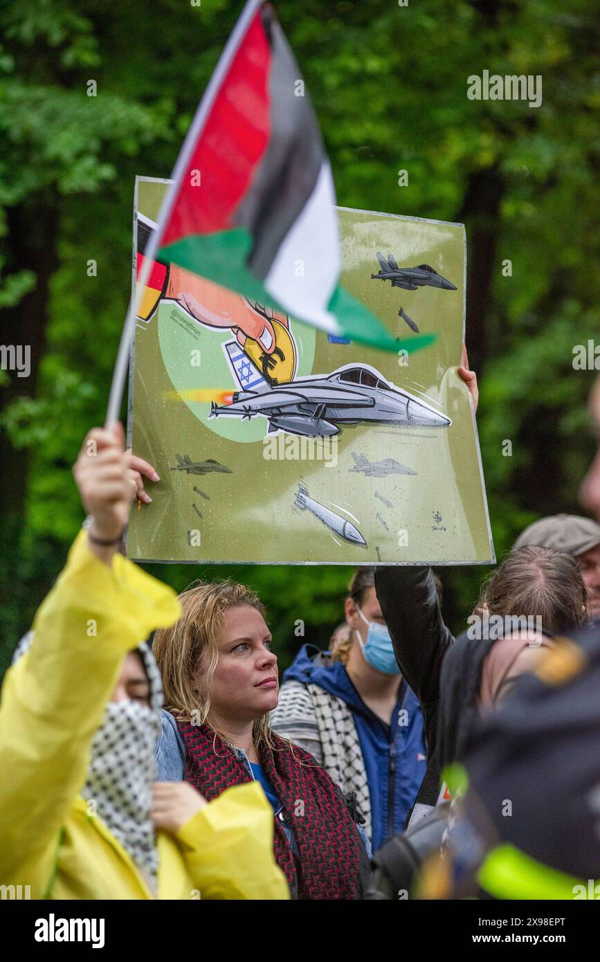 Pro-Palestinian female supporters holding a poster and expressing her ...