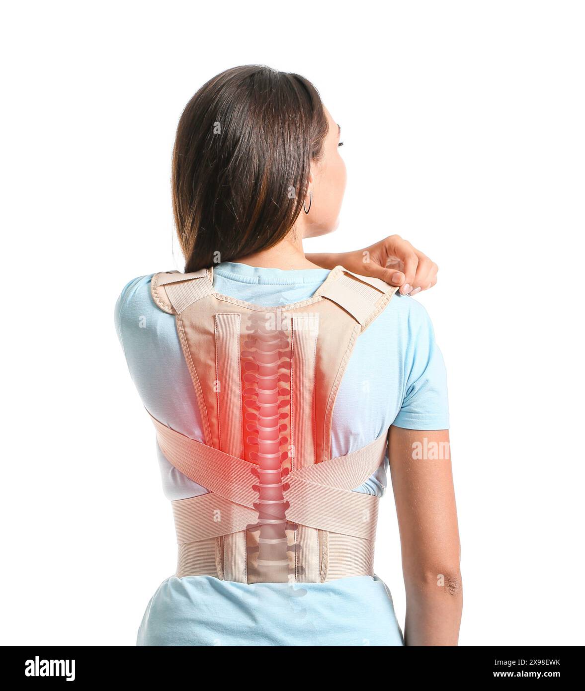 Young woman in back brace on white background Stock Photo - Alamy