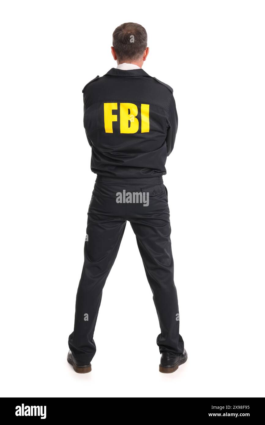Mature FBI agent on white background, back view Stock Photo - Alamy