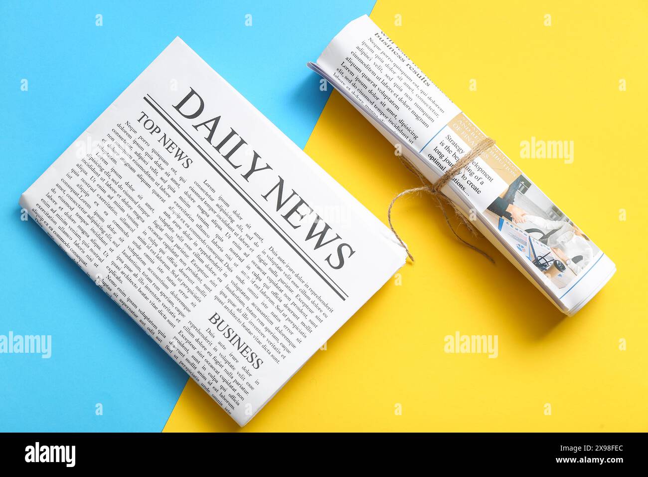 Different newspapers on colorful background Stock Photo - Alamy