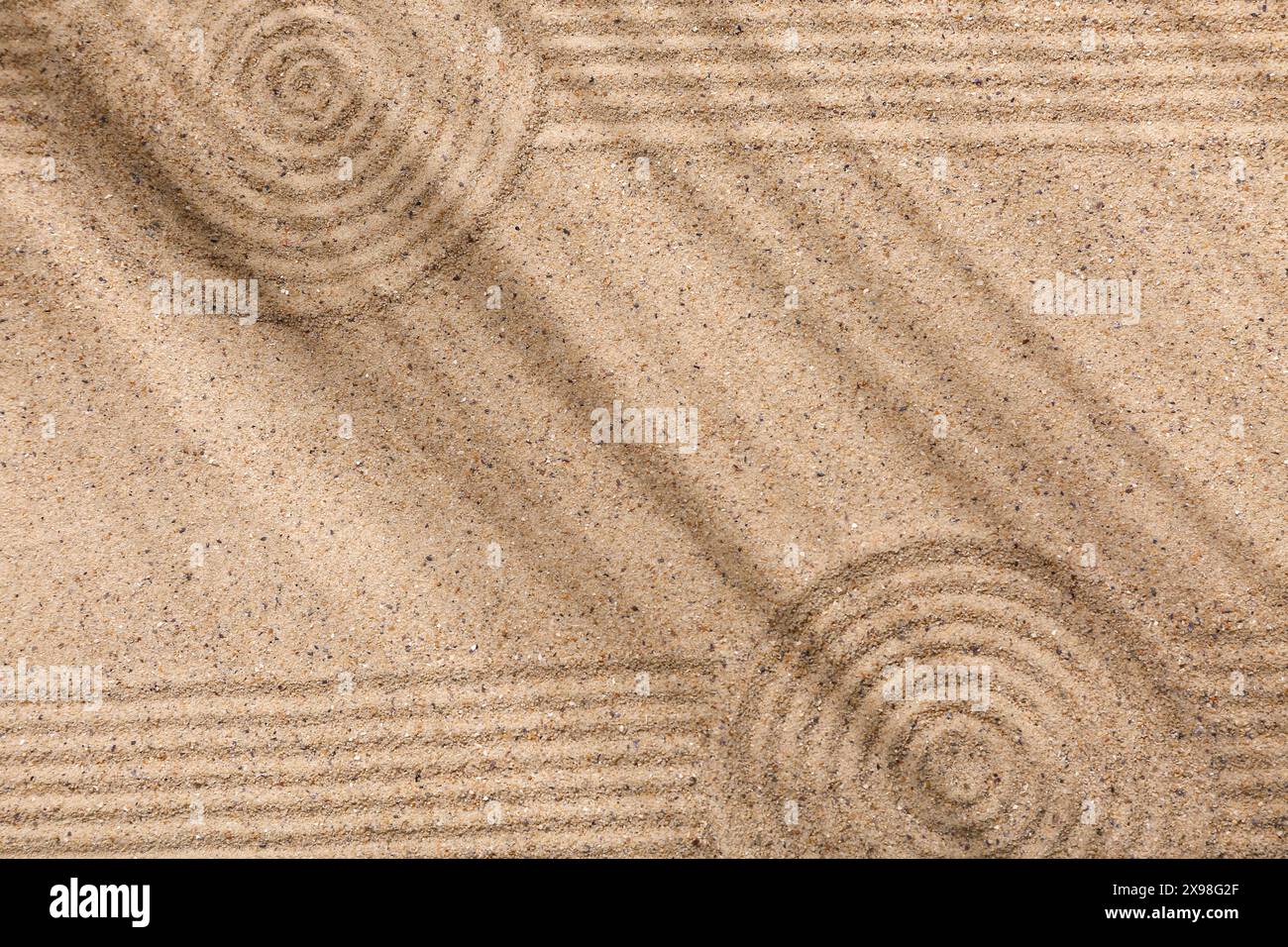 Texture of sand with pattern and shadow. Zen concept Stock Photo - Alamy