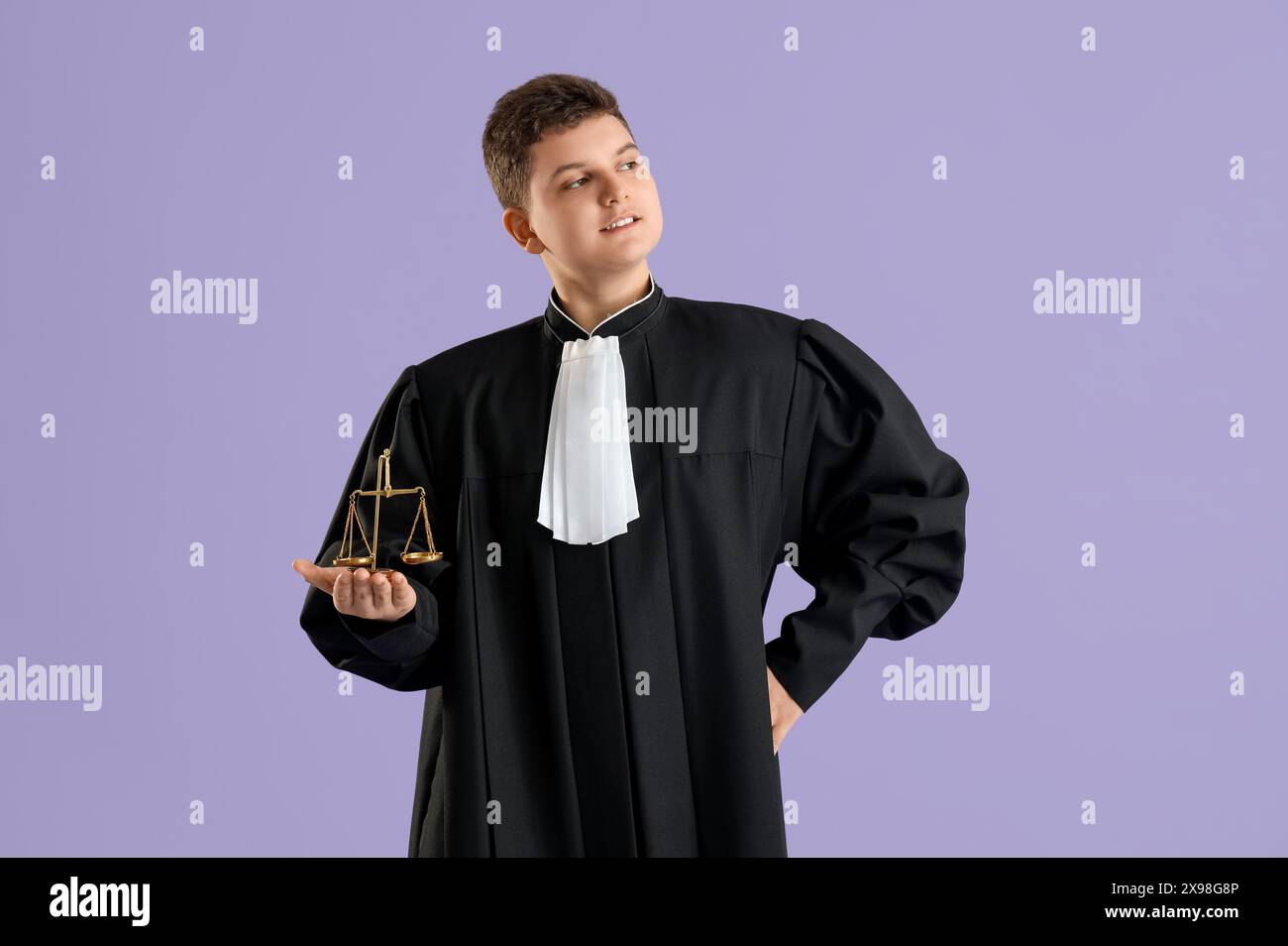Teenage judge with justice scales on lilac background Stock Photo - Alamy