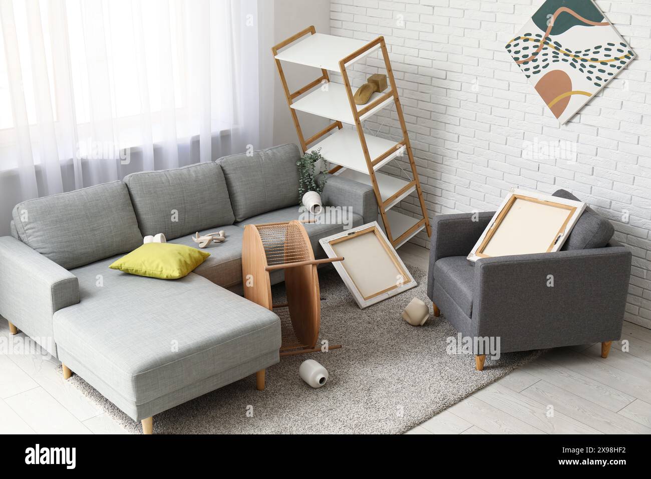 Interior of living room after strong earthquake Stock Photo - Alamy