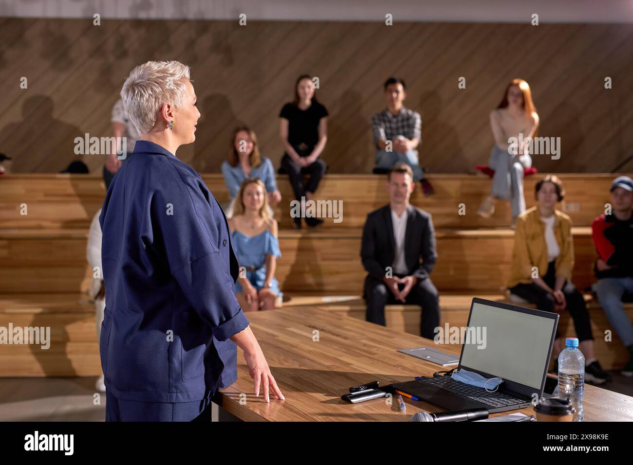 Female University Professor Holds Lecture to Classroom Full of Multi ...