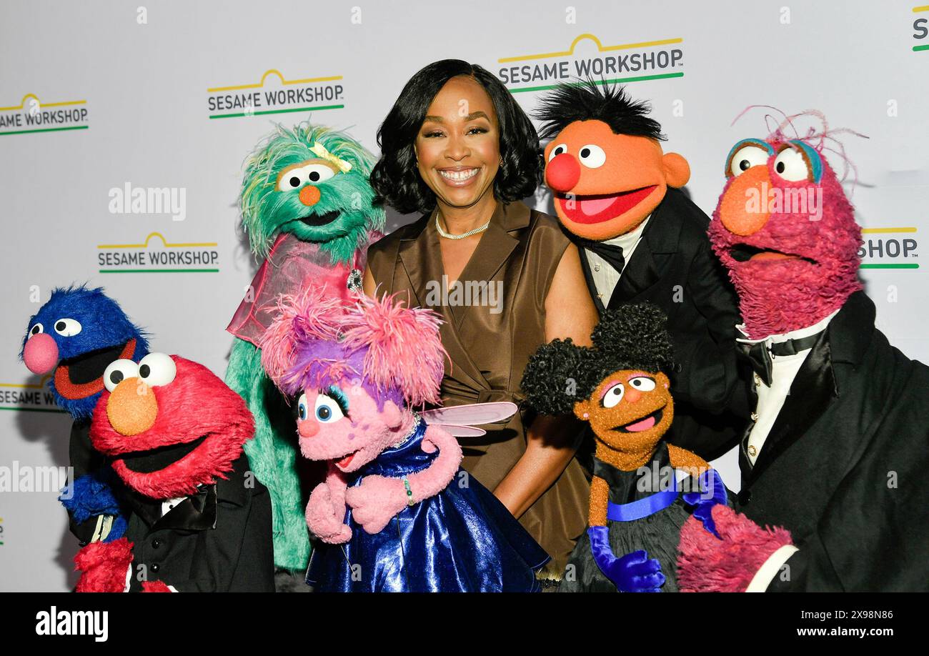 Shonda Rhimes, center, poses with Muppet characters at the Sesame ...