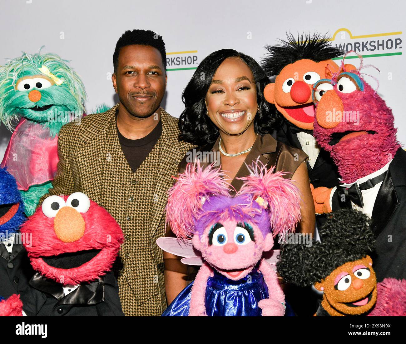 Honorees Leslie Odom Jr., center left, and Shonda Rhimes pose with ...