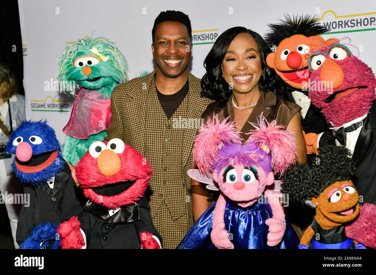 Honorees Leslie Odom Jr., center left, and Shonda Rhimes pose with ...