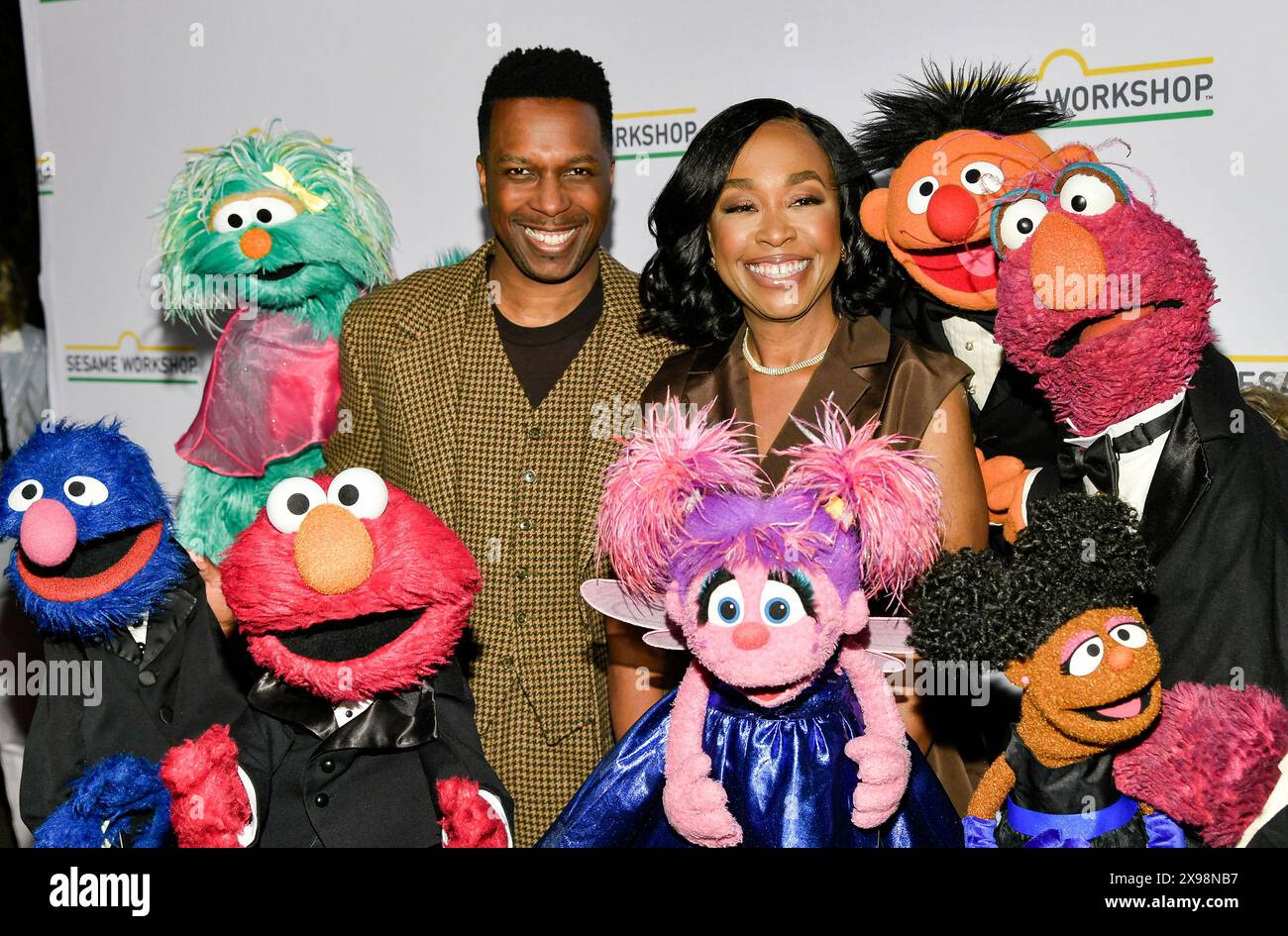 Honorees Leslie Odom Jr., center left, and Shonda Rhimes pose with ...