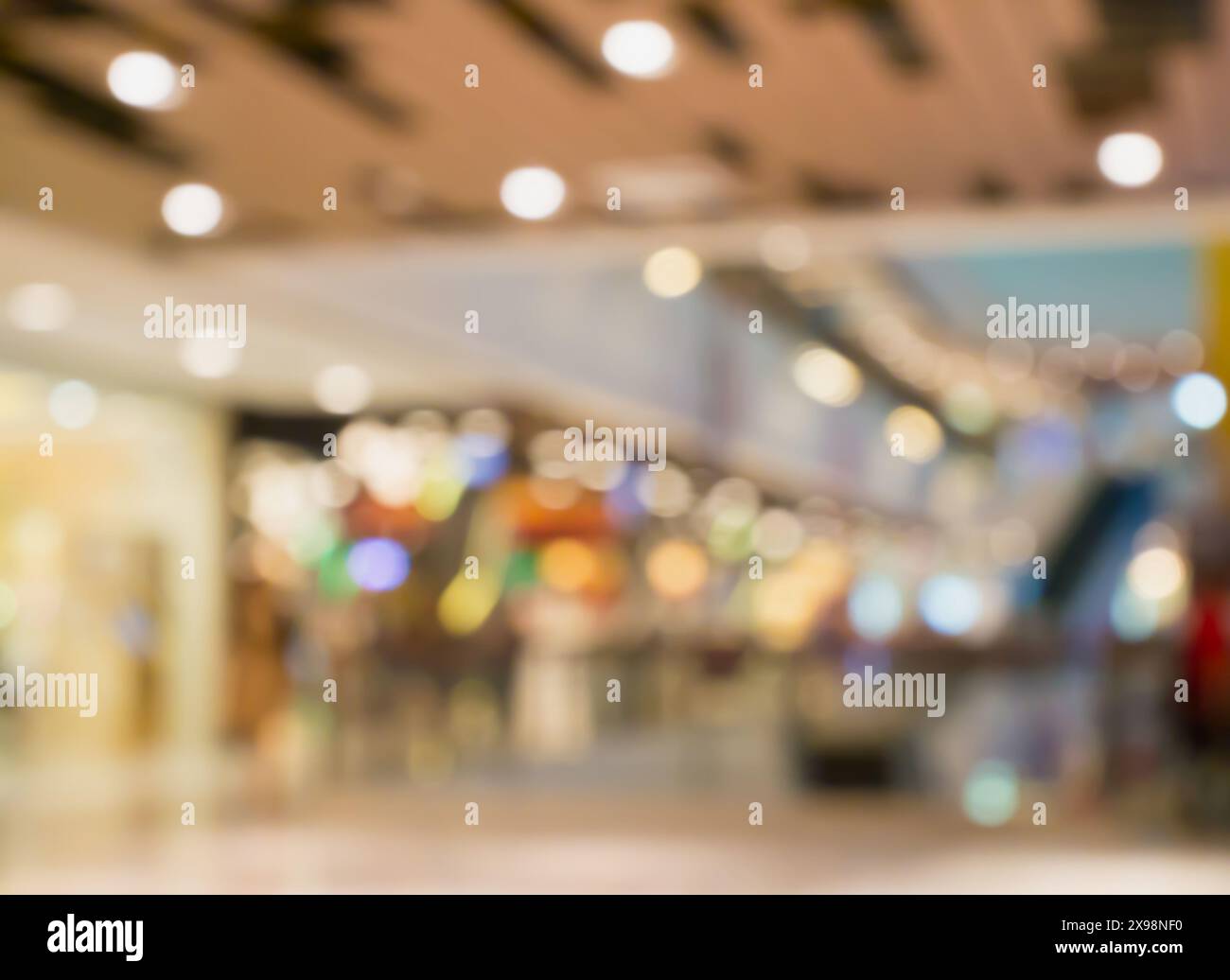 Shopping mall store blur background with bokeh light Stock Photo - Alamy