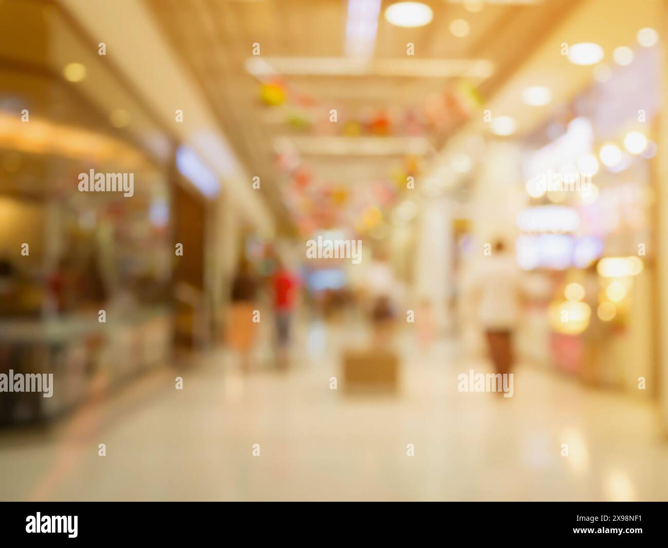 Shopping mall blur background with bokeh Stock Photo - Alamy