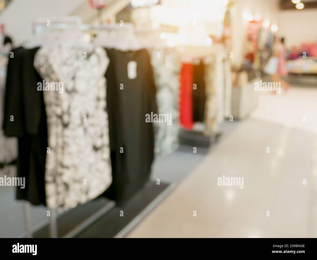blurred image background with clothing store Stock Photo - Alamy