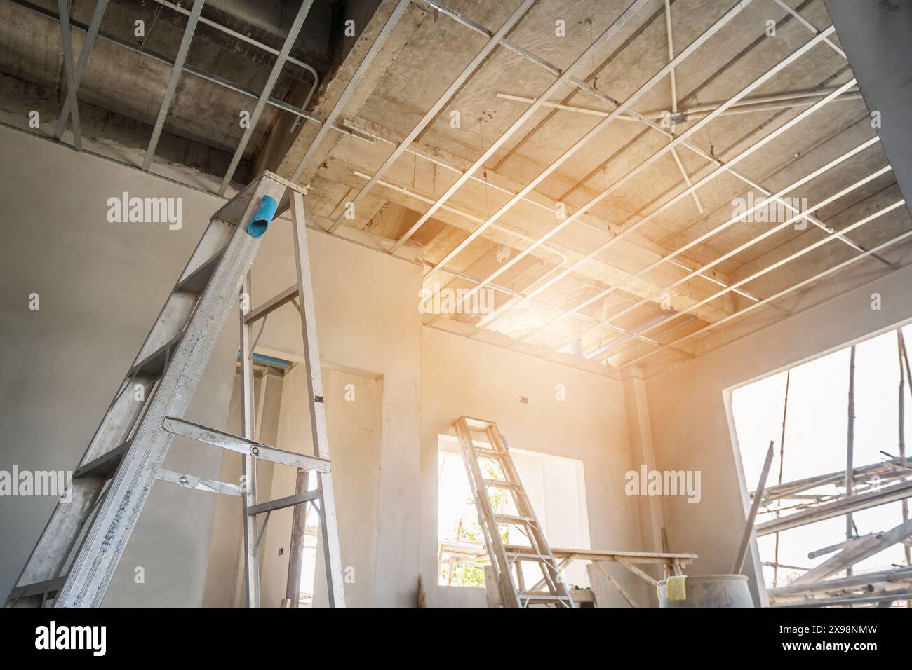 Install metal frame for plaster board ceiling at house under ...
