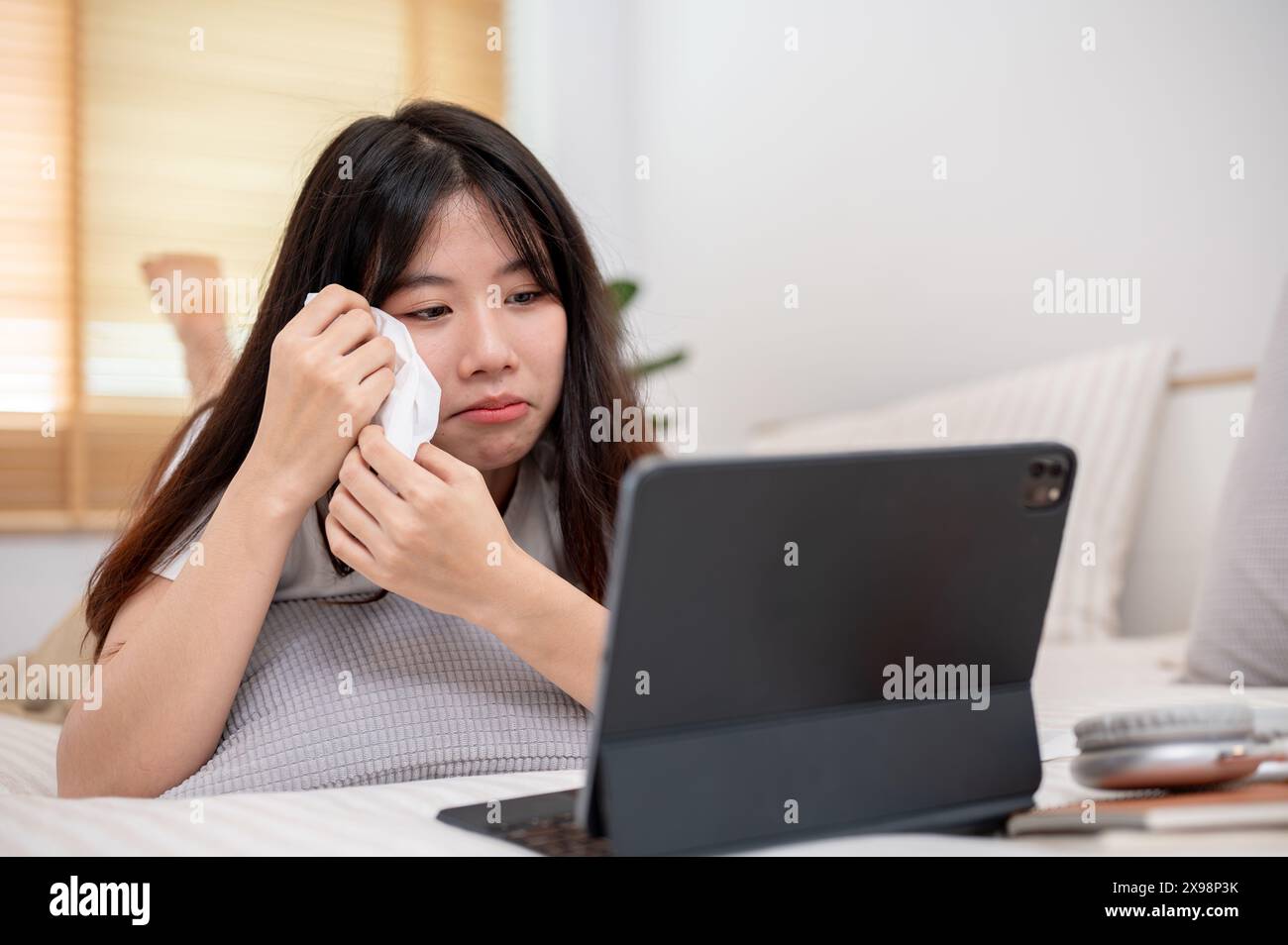 Asian woman crying in bed hi-res stock photography and images - Alamy