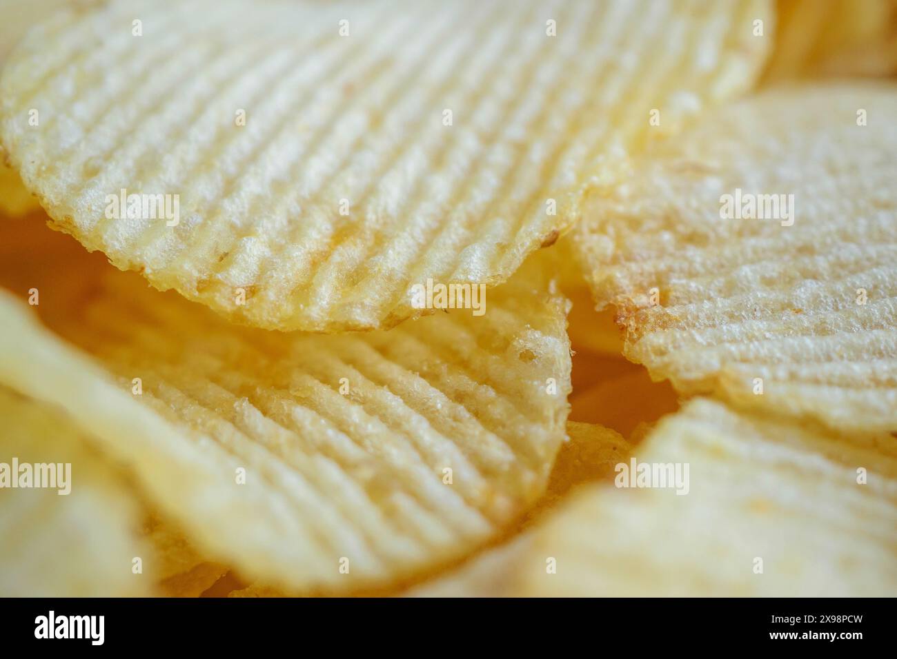 crispy potato chips snack texture background Stock Photo - Alamy