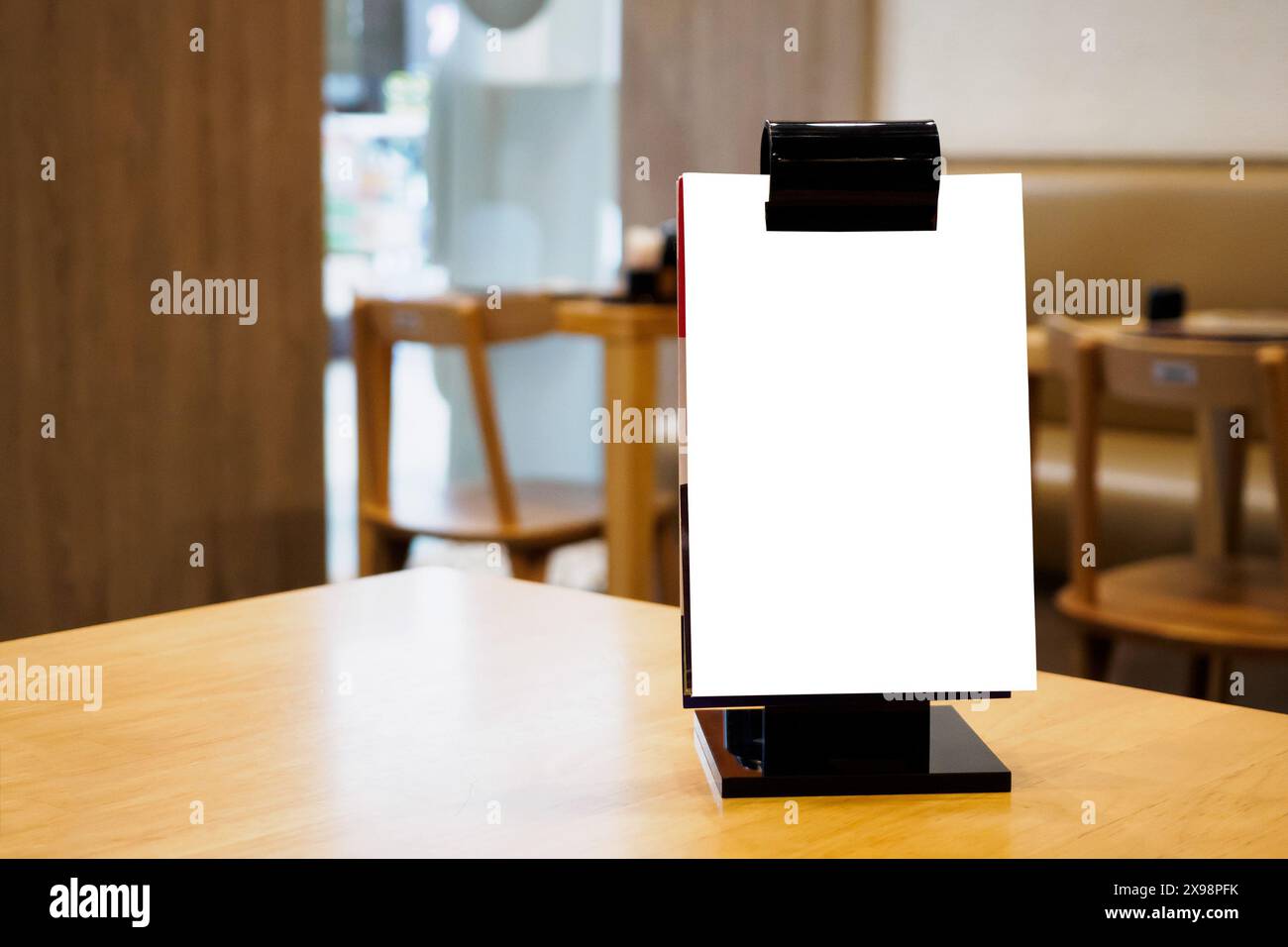 Mock up Blank white menu frame on cafe restaurant table Stock Photo - Alamy