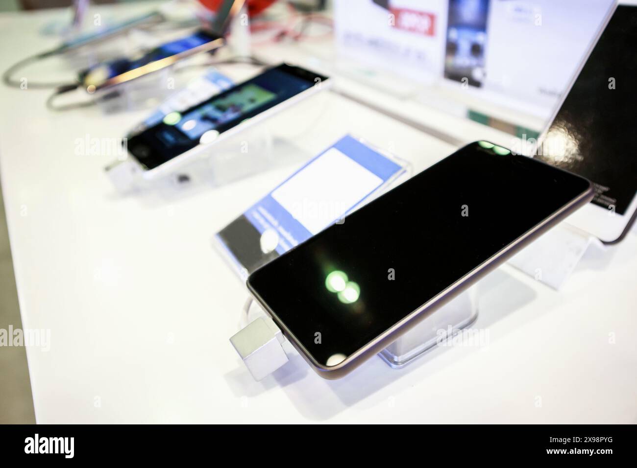 New mobile smartphone in telecommunication electronic store display ...