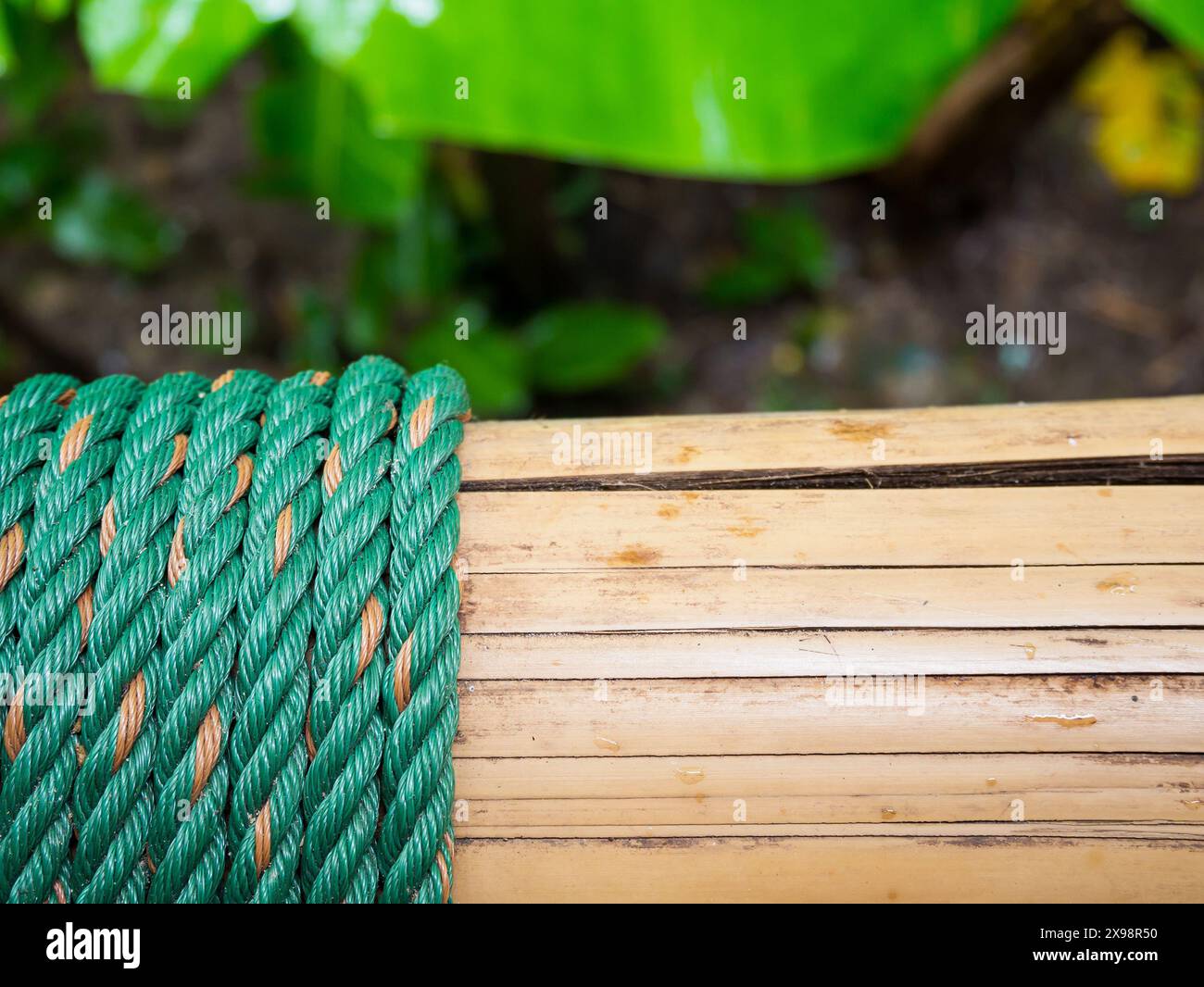 Old rope tied wooden pole hi-res stock photography and images - Alamy