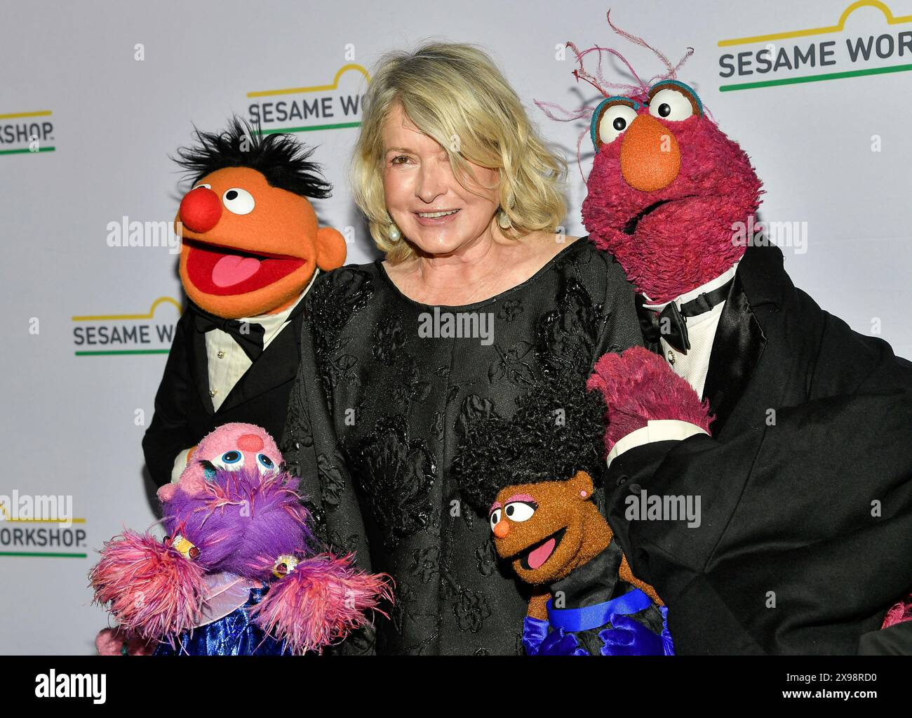 Martha Stewart, center, poses with Muppet characters at the Sesame ...