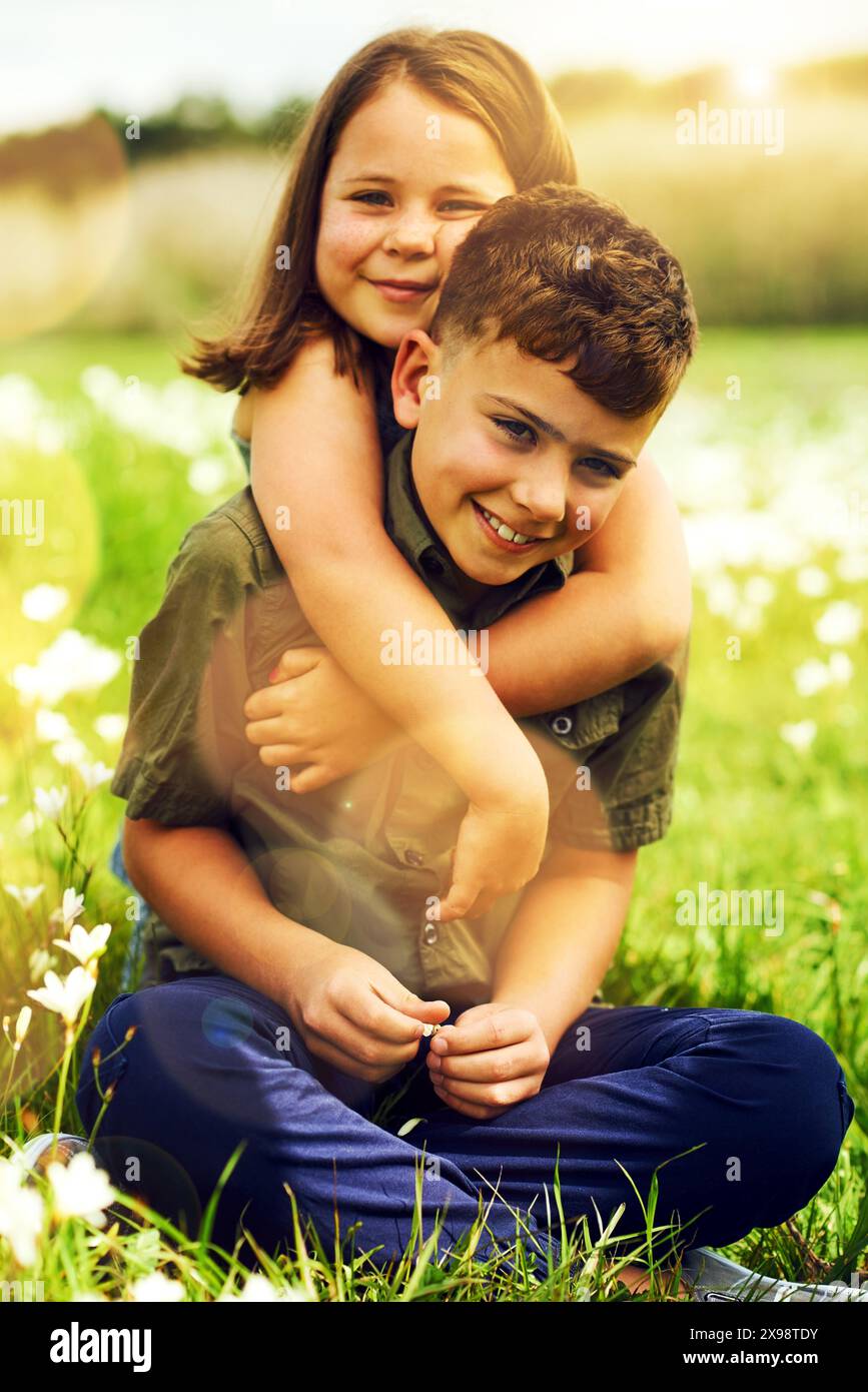 Portrait, siblings and hug with smile in park together for support ...
