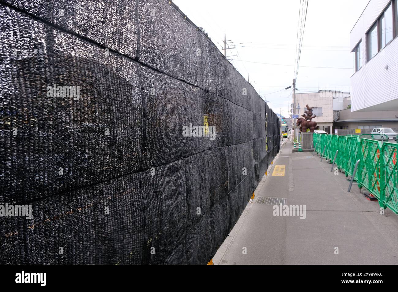 A general view of a barrier near the Lawson convenience store in ...