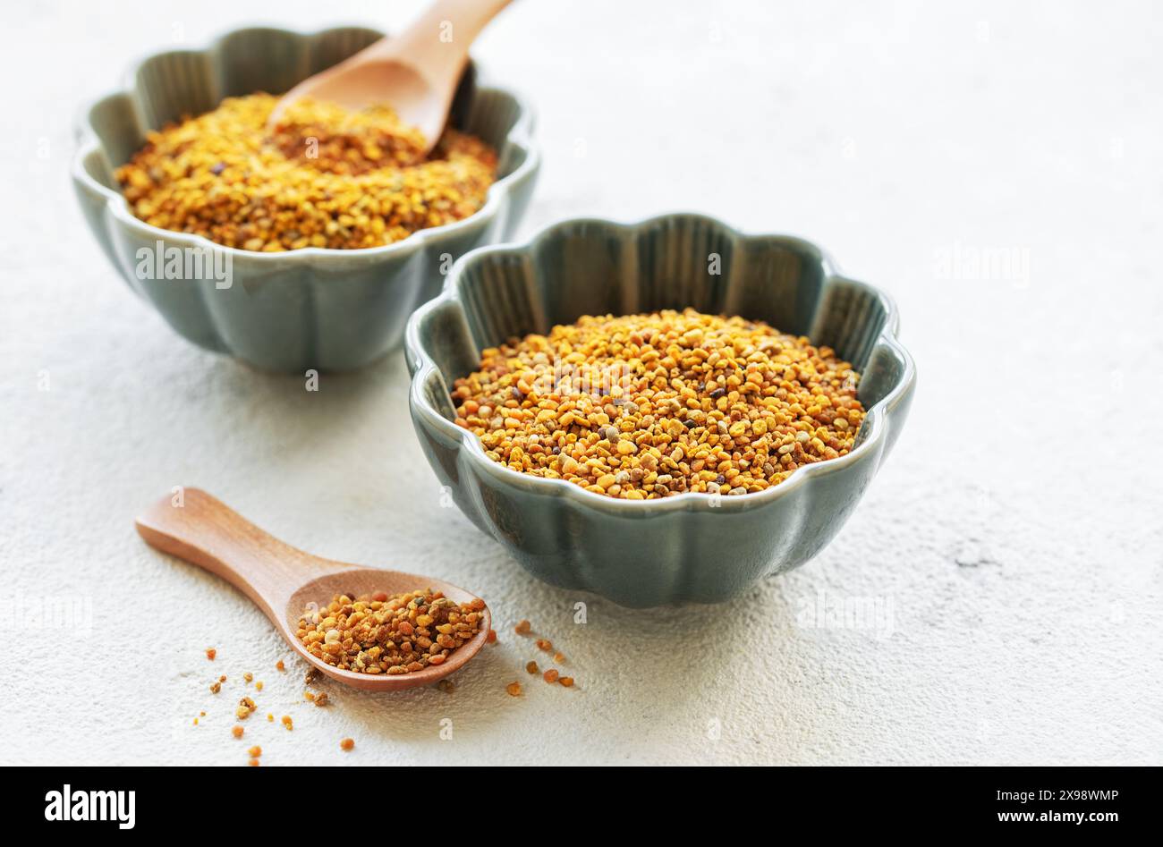 Healthy bee pollen grains. Bee pollen on ceramic bowls Stock Photo - Alamy