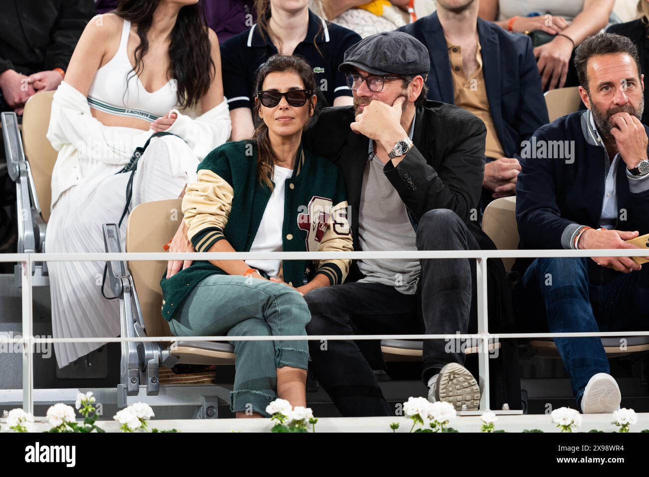 Paris, France. 29th May, 2024. Reem Kherici and her husband Gilles Lemaire in stands at the 2024 ...