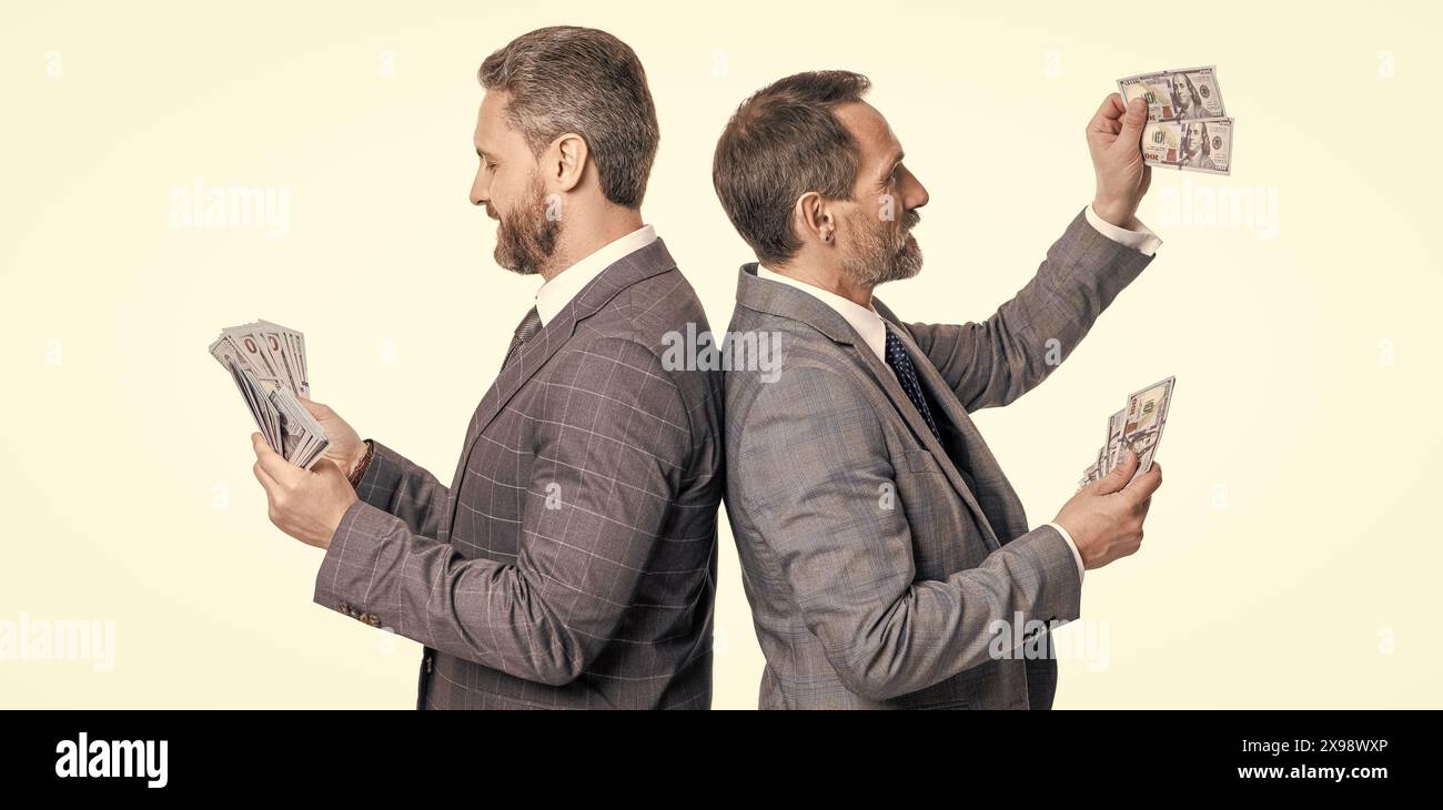 Businessmen reinvest profit for growth. Businessmen with money isolated ...