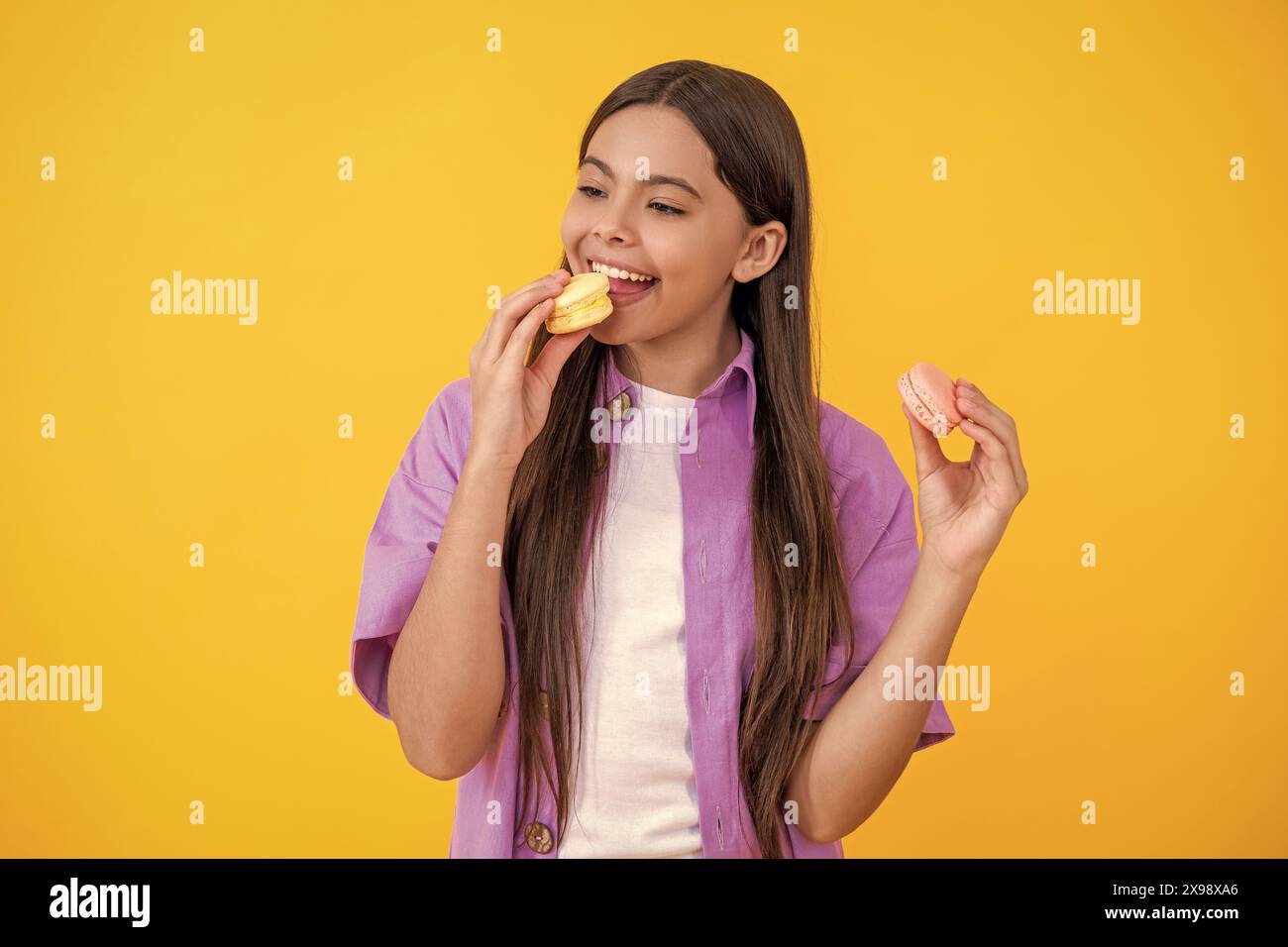 french cookie of macaroon. girl enjoying flavor of macaron. girl with ...