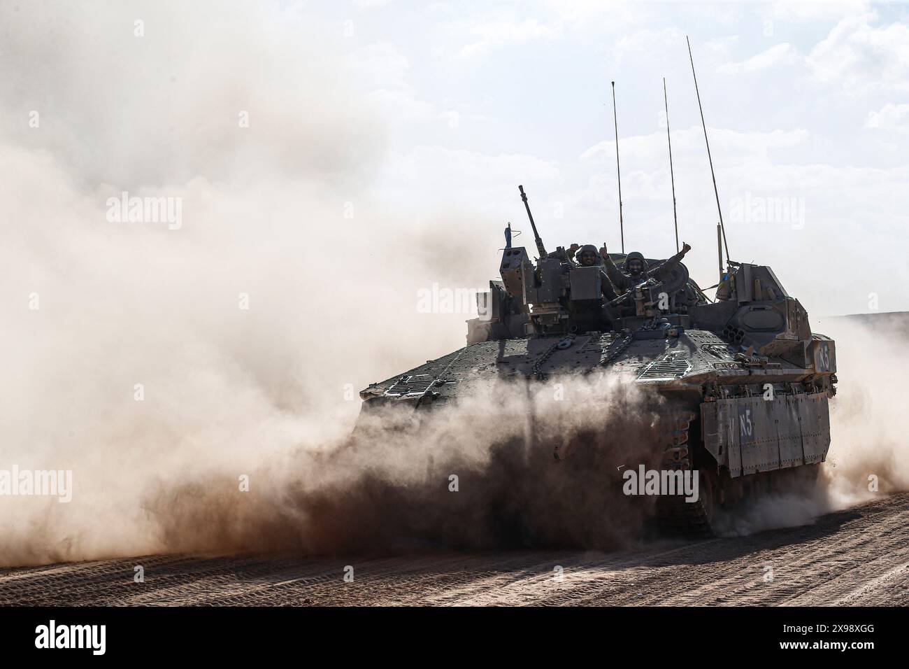 Rafah, Israel. 29th May, 2024. An Israeli tank operates, amid the ...