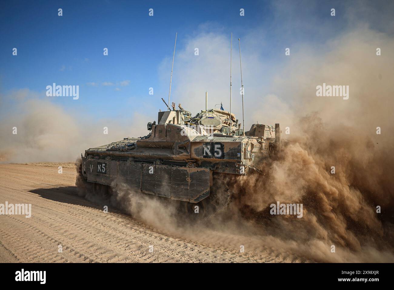 An Israeli tank operates, amid the ongoing conflict between Israel and ...
