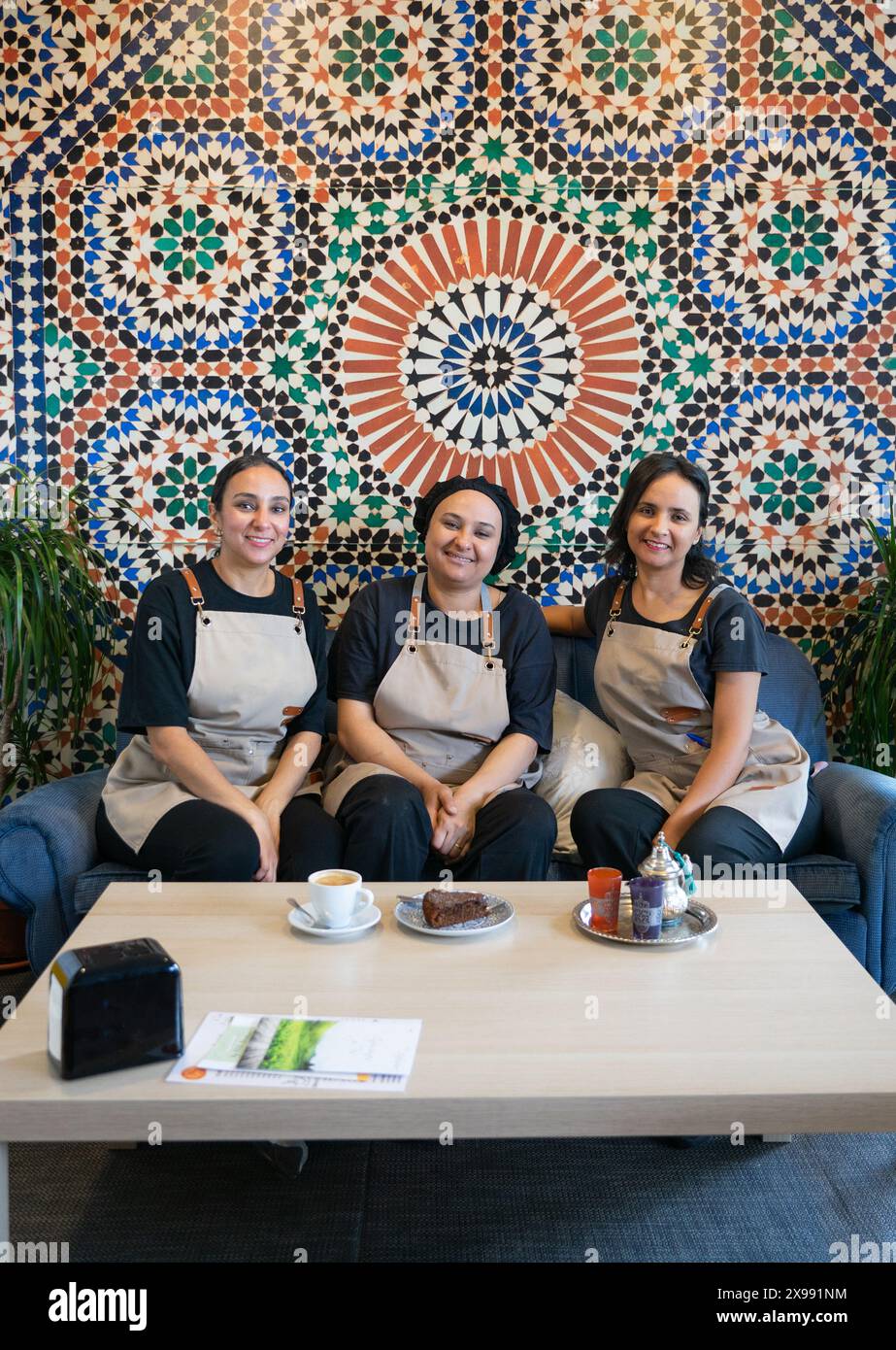 Three Moroccan sister women in their family Moroccan coffee business ...
