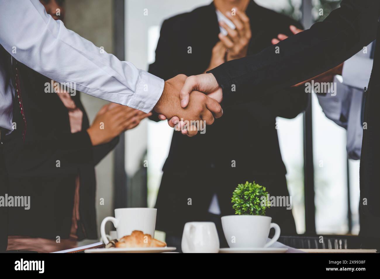 Team Business Partners shaking hands together to Greeting Start up new ...