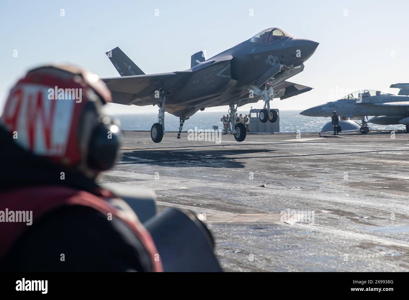 An F-35C Lightning II, attached to Strike Fighter Squadron (VFA) 147, lands on Nimitz-class ...