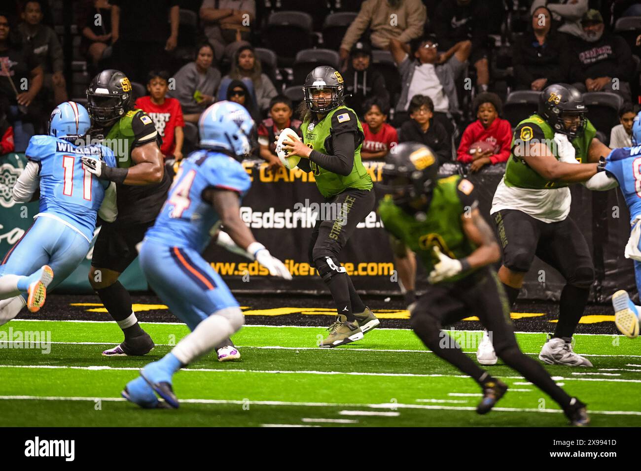 San Diego Strike Force quarterback Nate Davis (8) looks down field in ...
