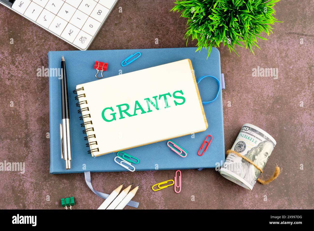 GRANT word, text written on a blank sheet of a notebook. View from ...