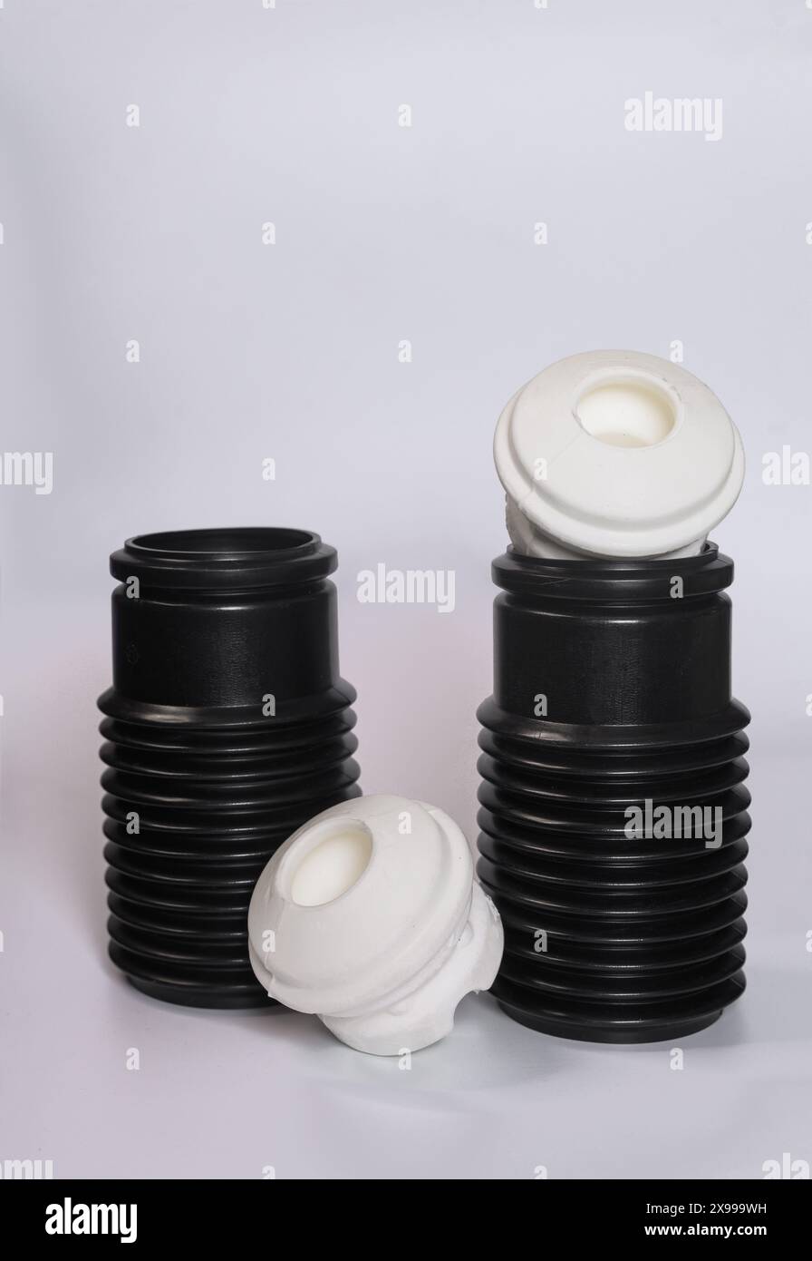 protection of automobile shock absorbers from dust and dirt. vertical ...