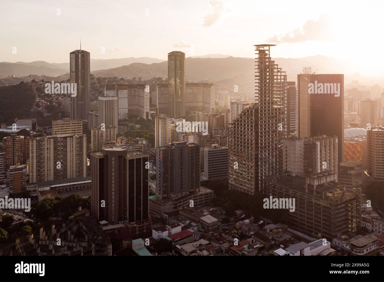 Aerial view of Caracas at sunset with the David Tower landmark ...