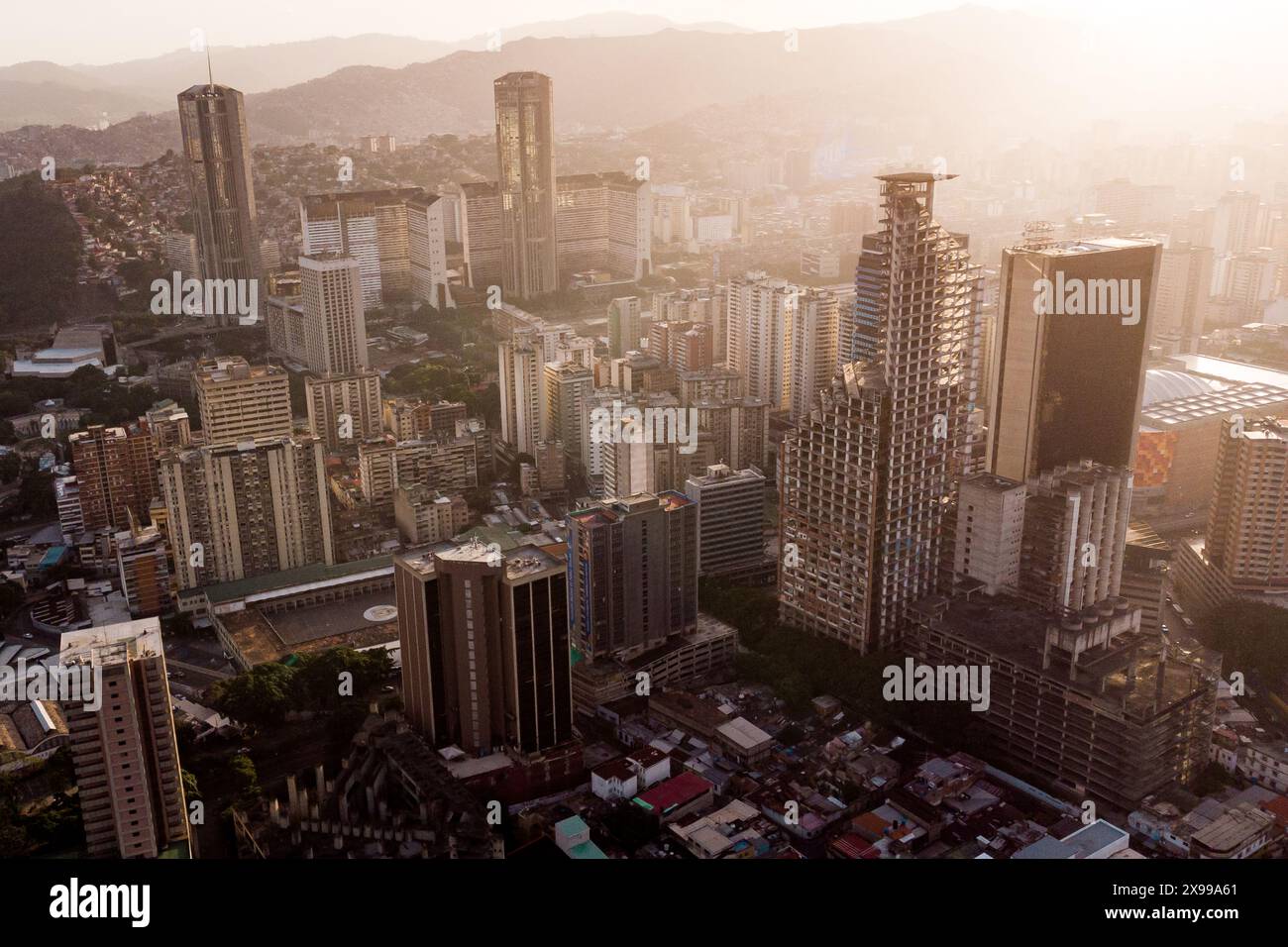 Aerial view of Caracas at sunset with the David Tower landmark ...