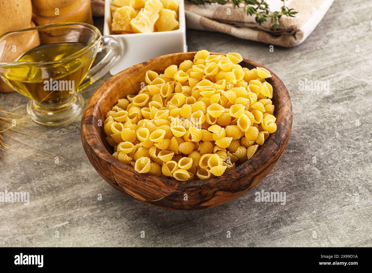 Italian cuisine - dry conchiglie shell pasta Stock Photo - Alamy