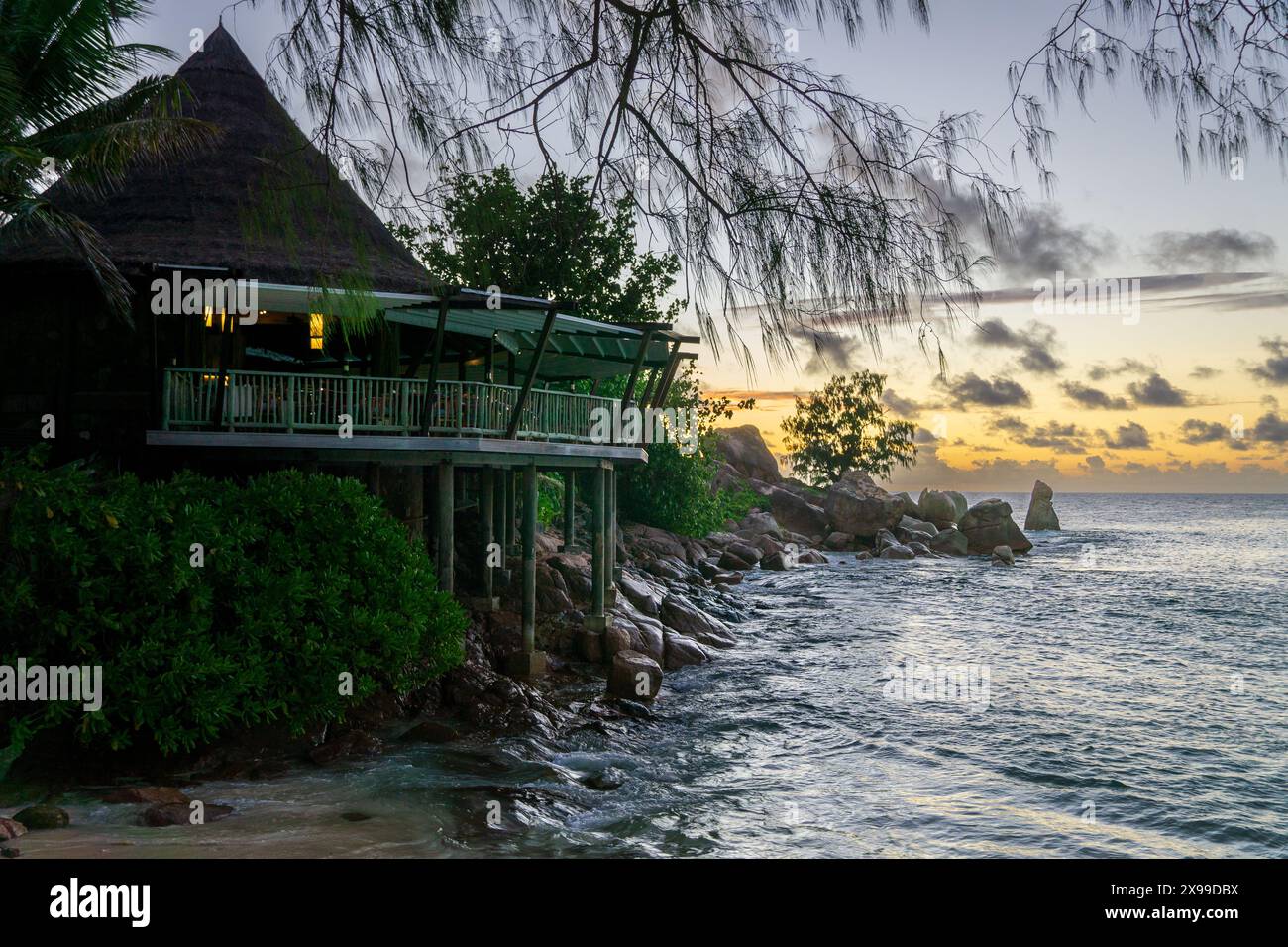 A restaurant by a beach in the Seychelles Stock Photo - Alamy