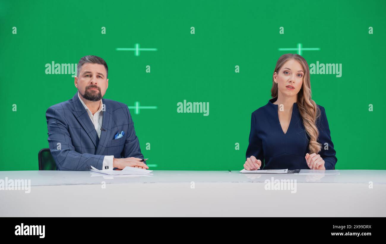 Newsroom TV Studio Live News Program: Caucasian Male and Female ...