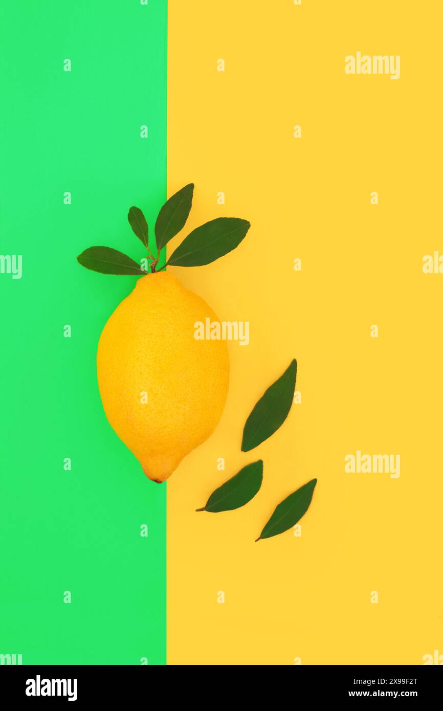 Lemon citrus fruit health food abstract design with leaves on green ...