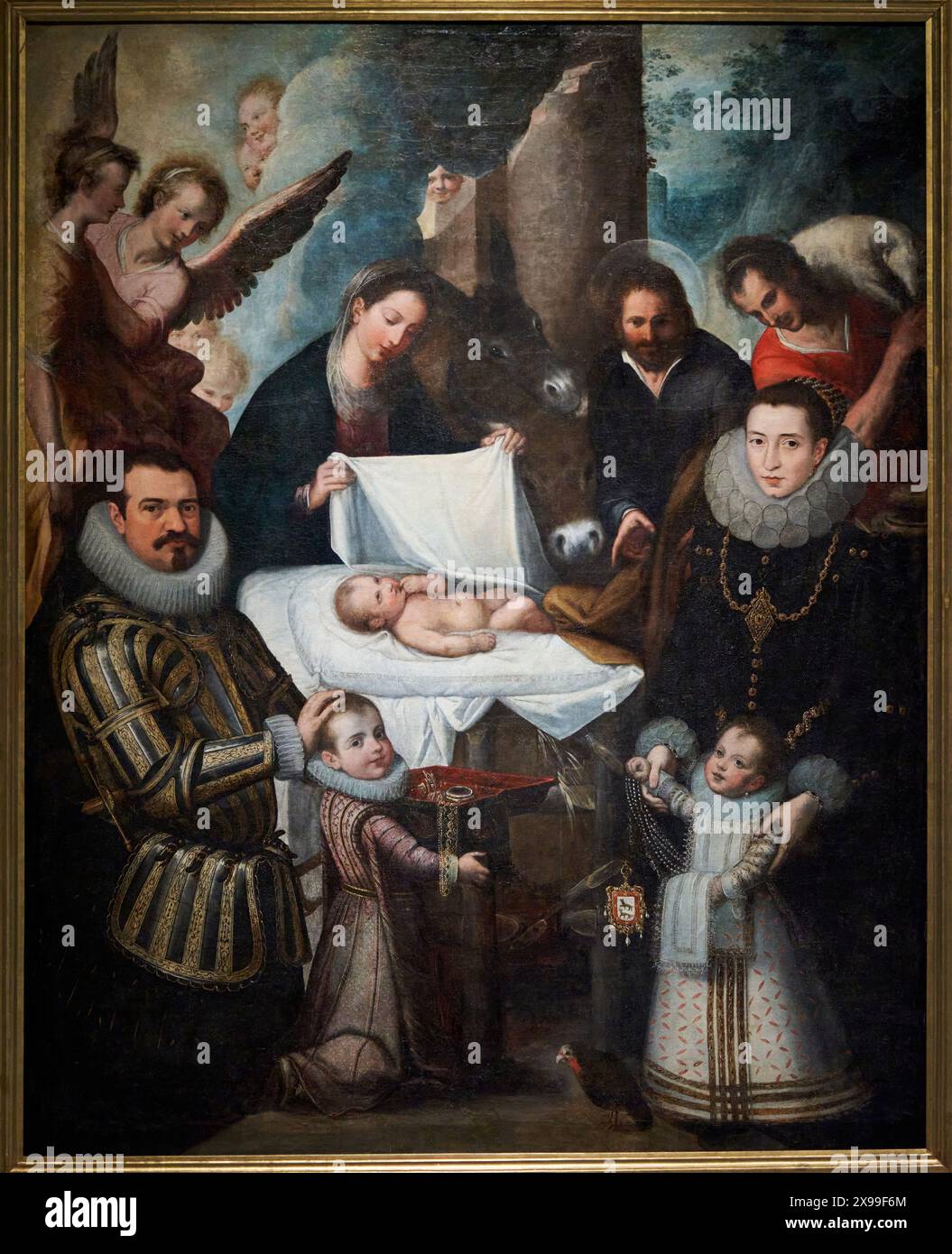 Adoration of christ with the ayala family hi-res stock photography and ...
