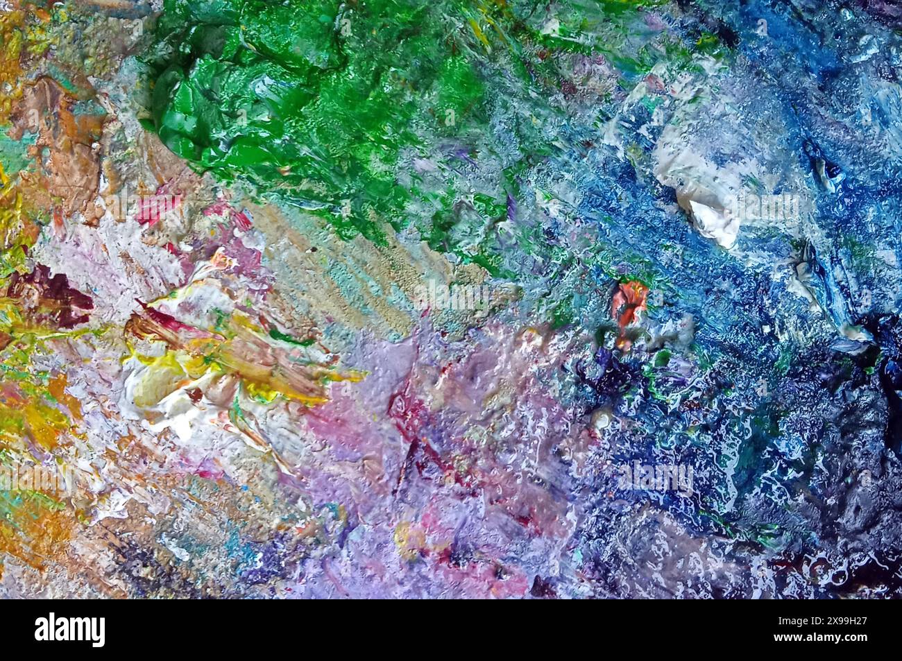 Oil paints mixed together on a palette for the background Stock Photo ...
