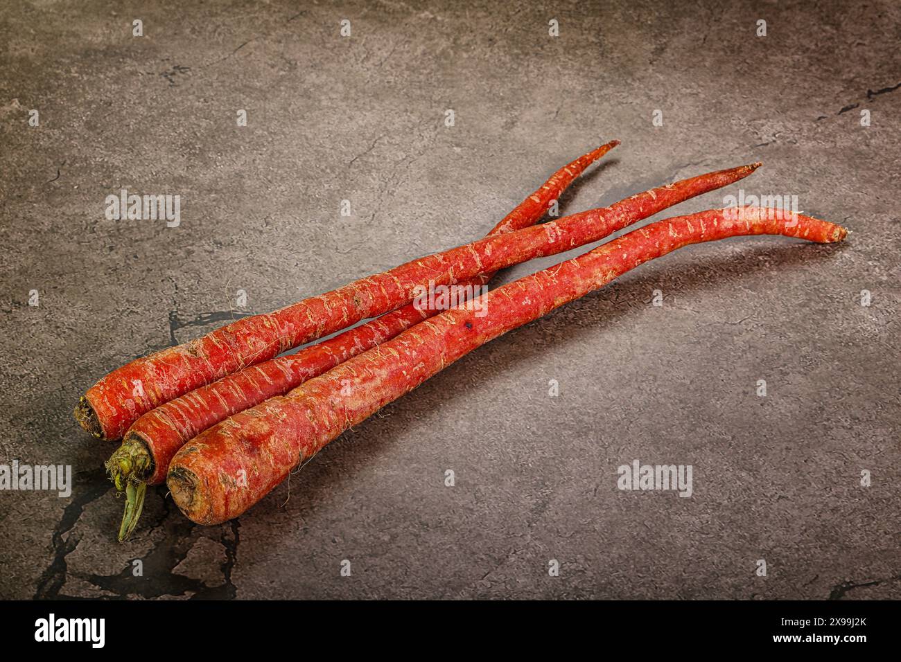 Raw ripe Indian red carrot root Stock Photo - Alamy