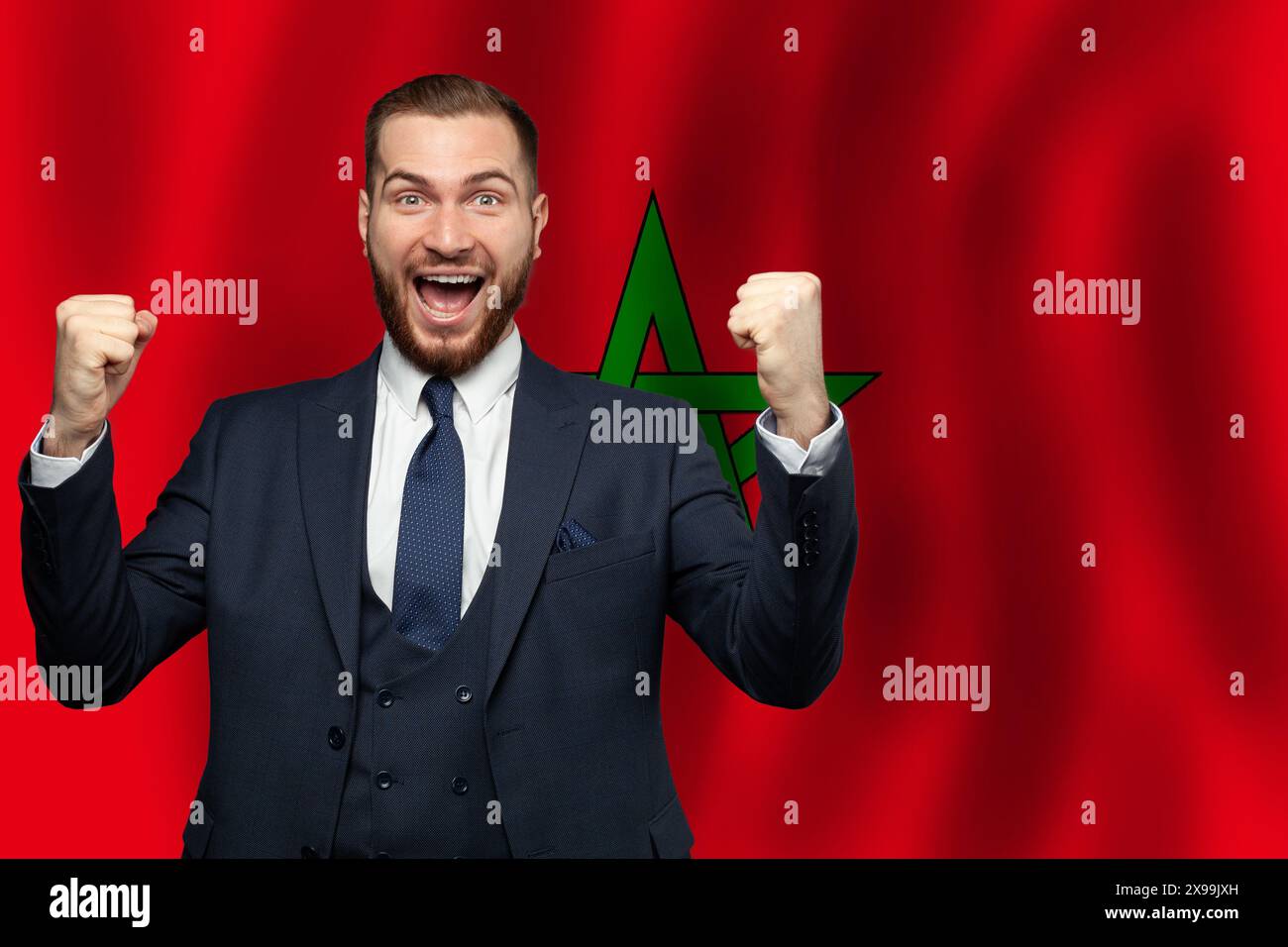 Moroccan happy businessman on the background of flag of Morocco ...