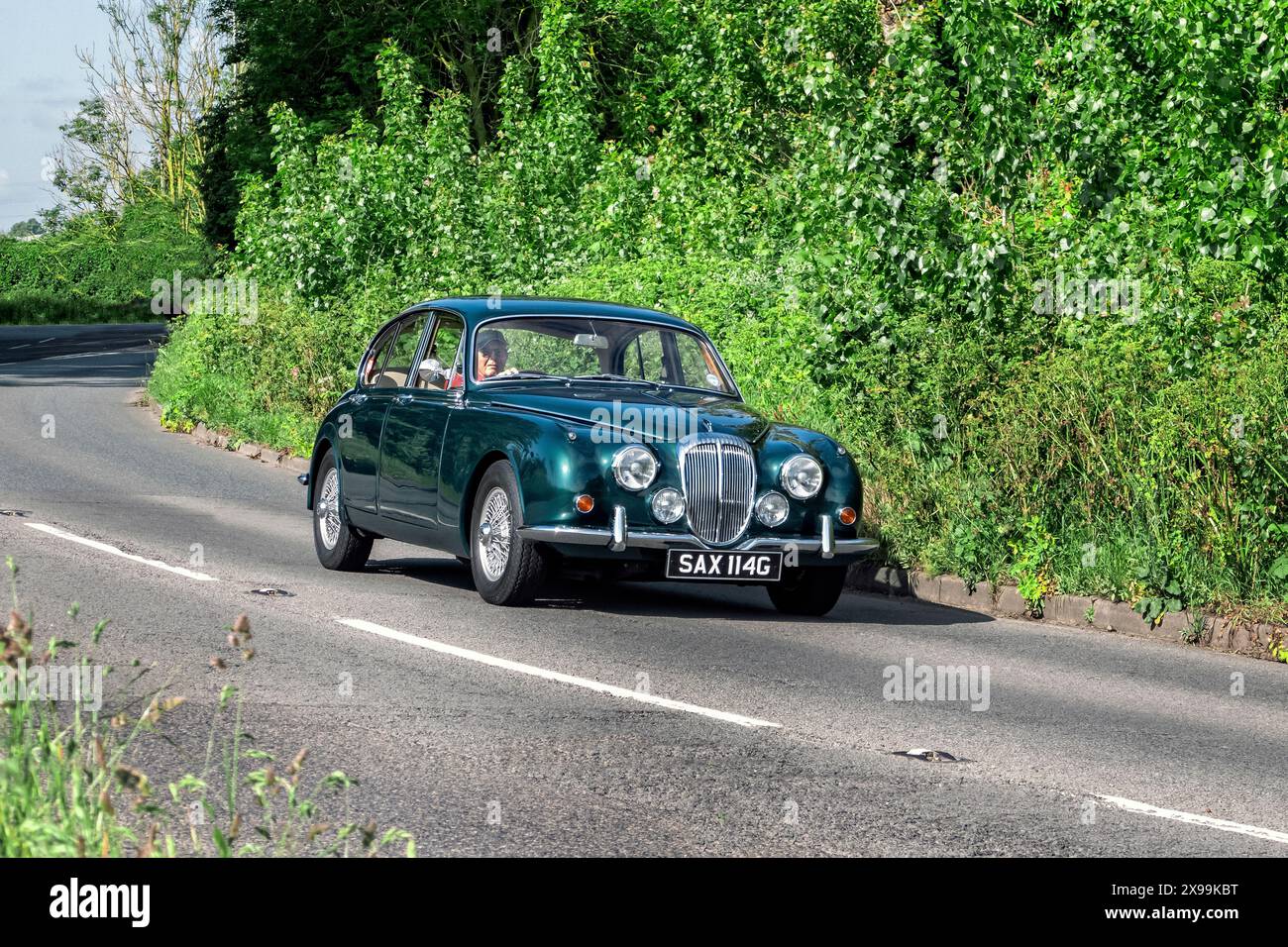 1969 Daimler V8 driving along a road in Kent Uk Stock Photo - Alamy