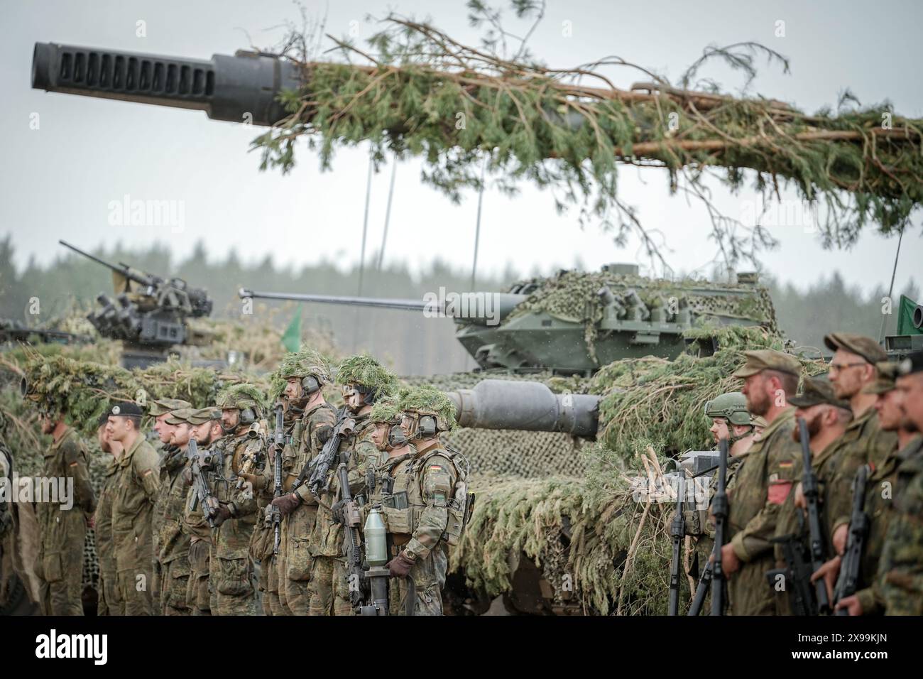 Pabrade, Lithuania. 29th May, 2024. Bundeswehr soldiers stand in front ...