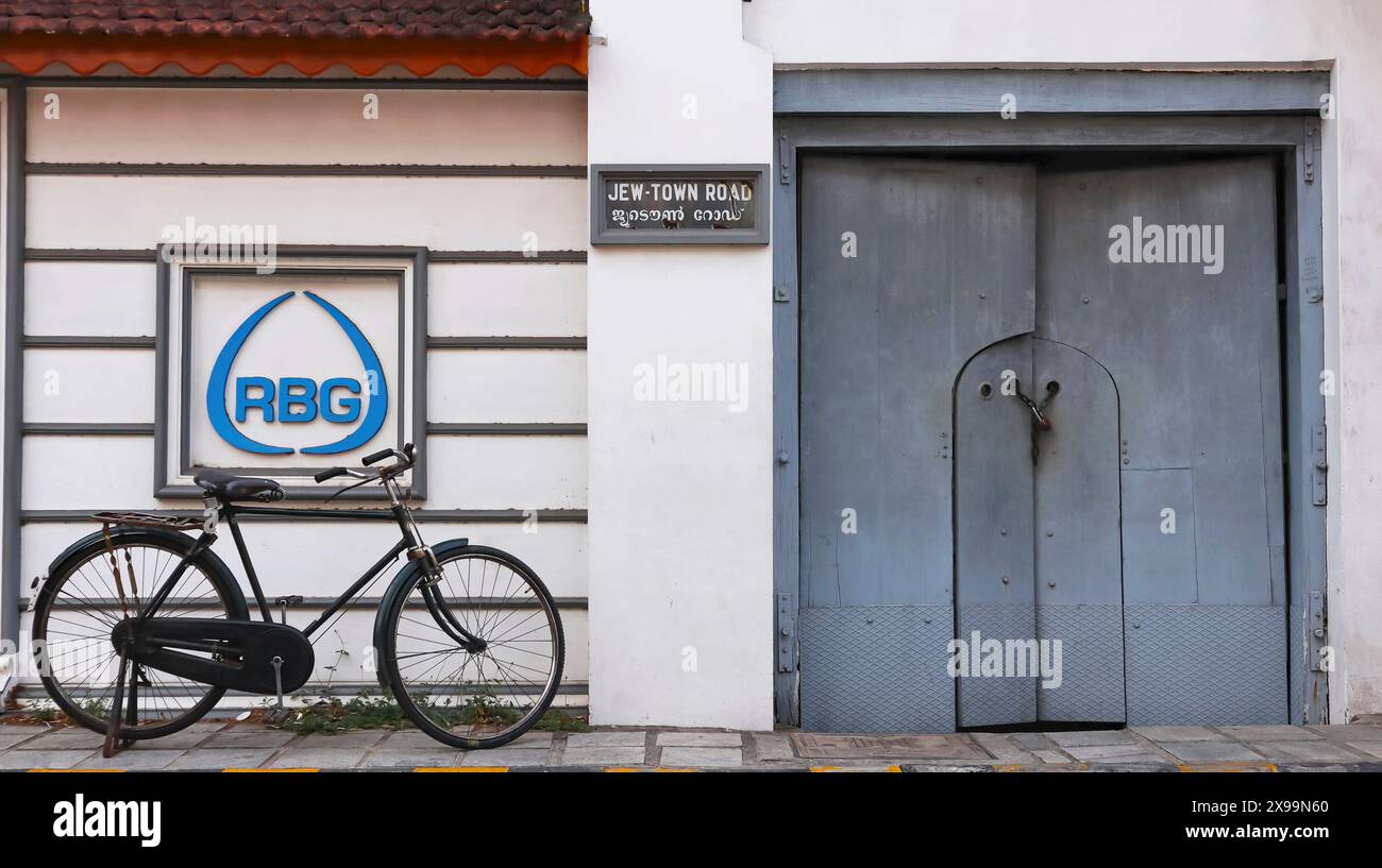 Closed Gate and Old Cycle on the Street of Jewish Town, Fort Kochi ...