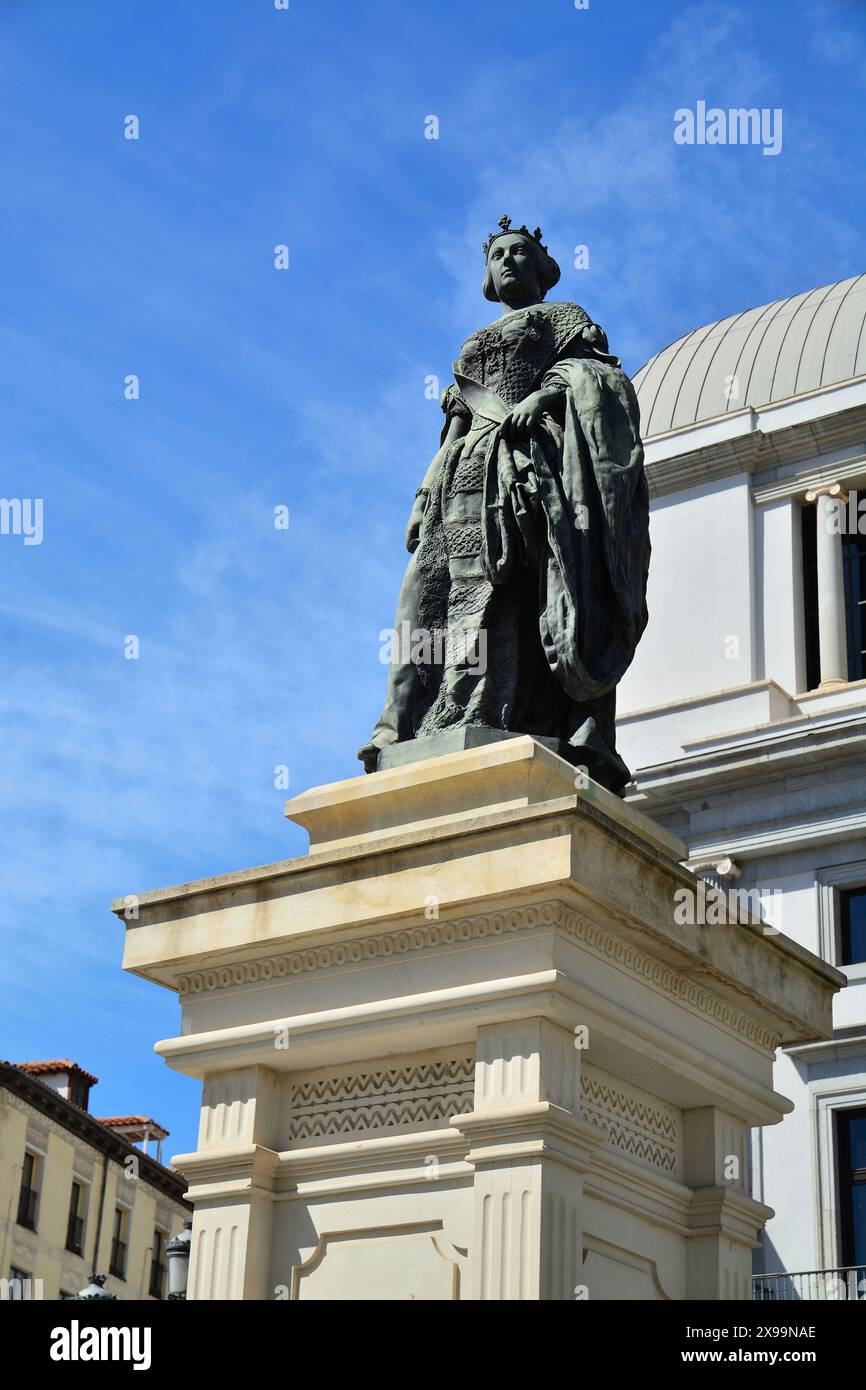 Madrid, Spain - April 14, 2024. Isabel II statue in front of the Royal ...